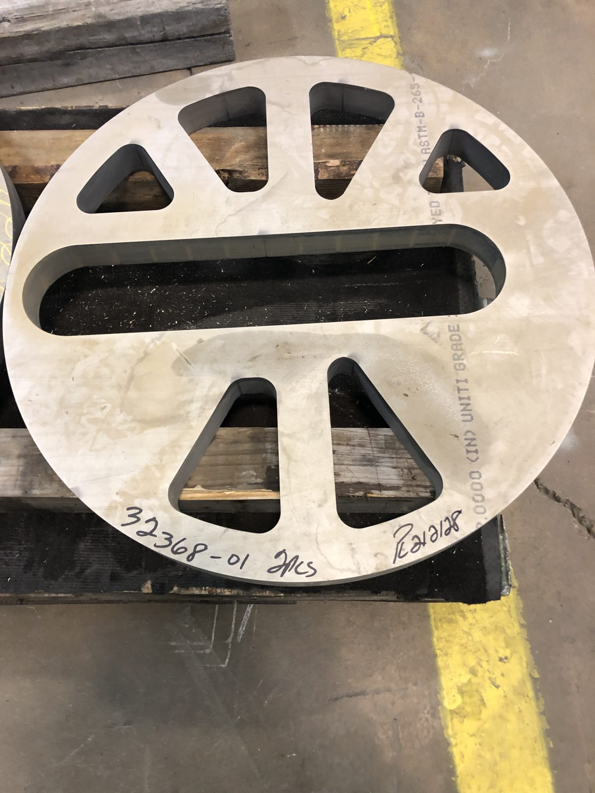 Titanium Slotted Disc - Sandmeyer Steel Company